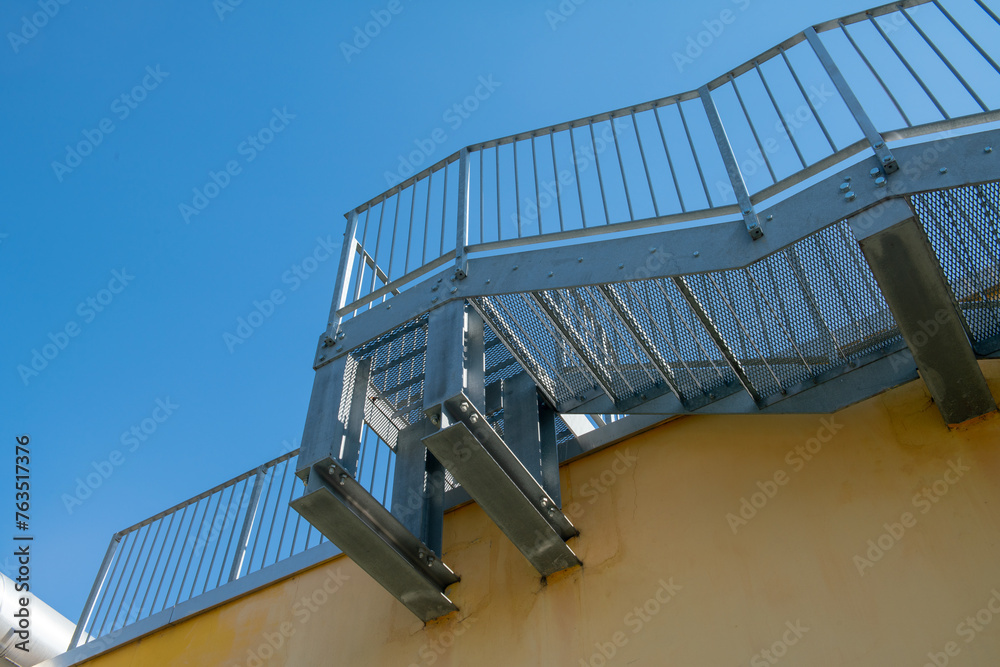 Foto de Stock fire escape staircase, pedestrian passage for emergency ...