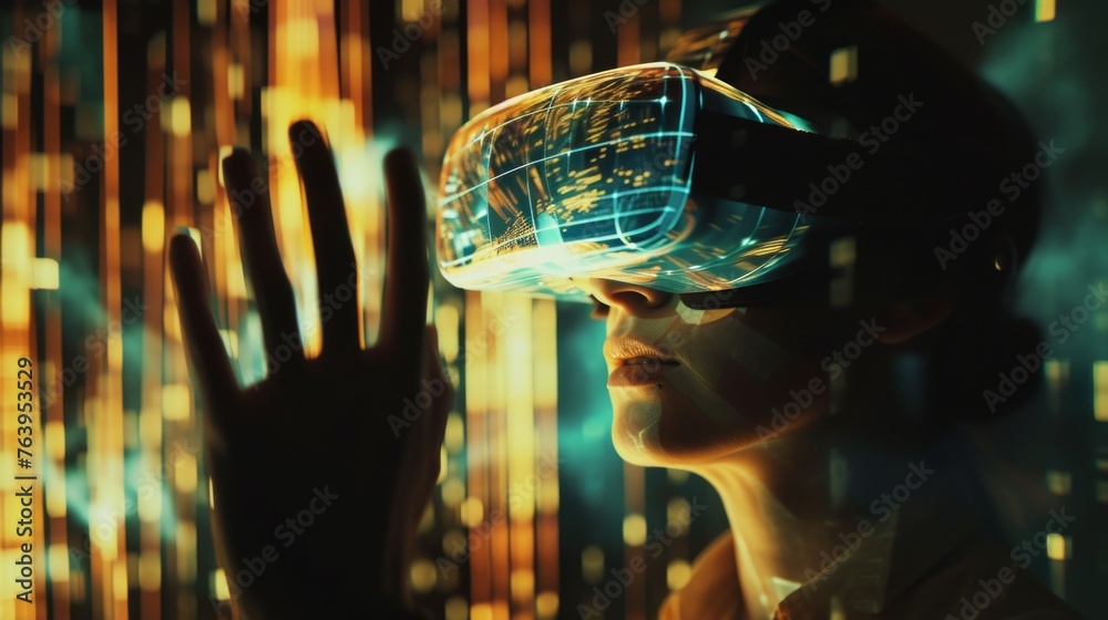 A woman with a VR headset reaches out to touch an invisible interface ...
