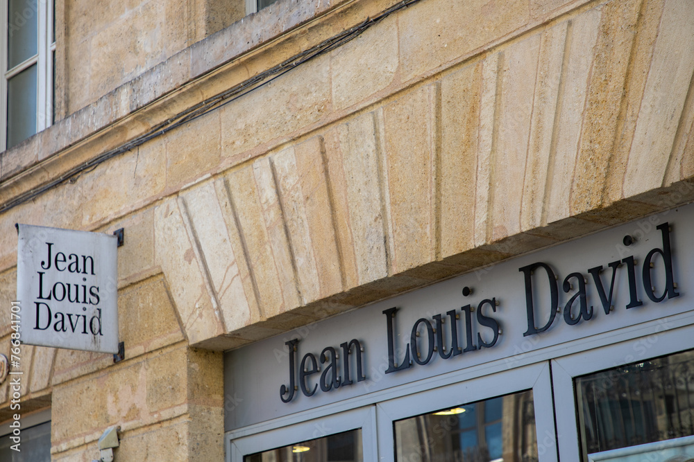 Jean Louis David french fashion logo brand chain haircut sign text ...