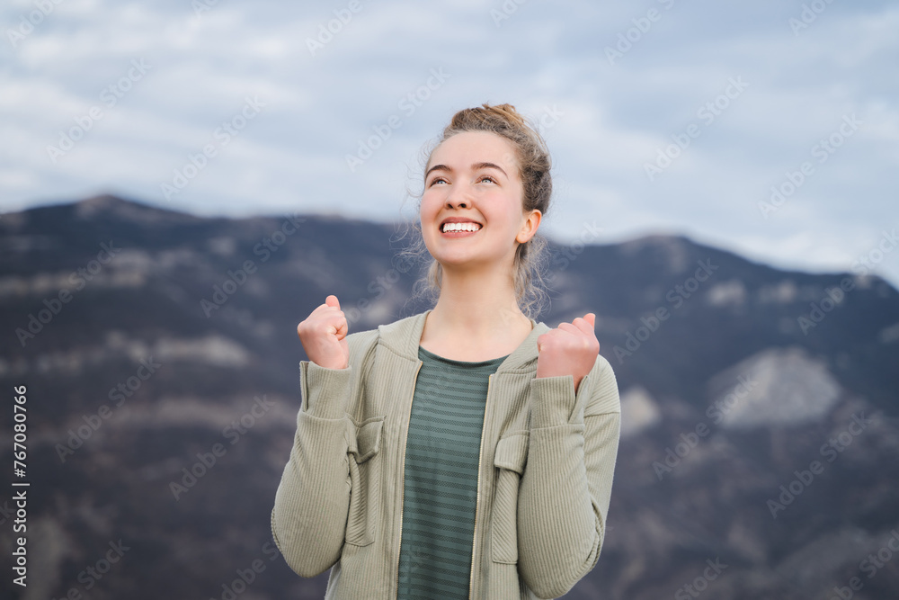 Young positive optimistic woman feeling happy, surprised and proud ...