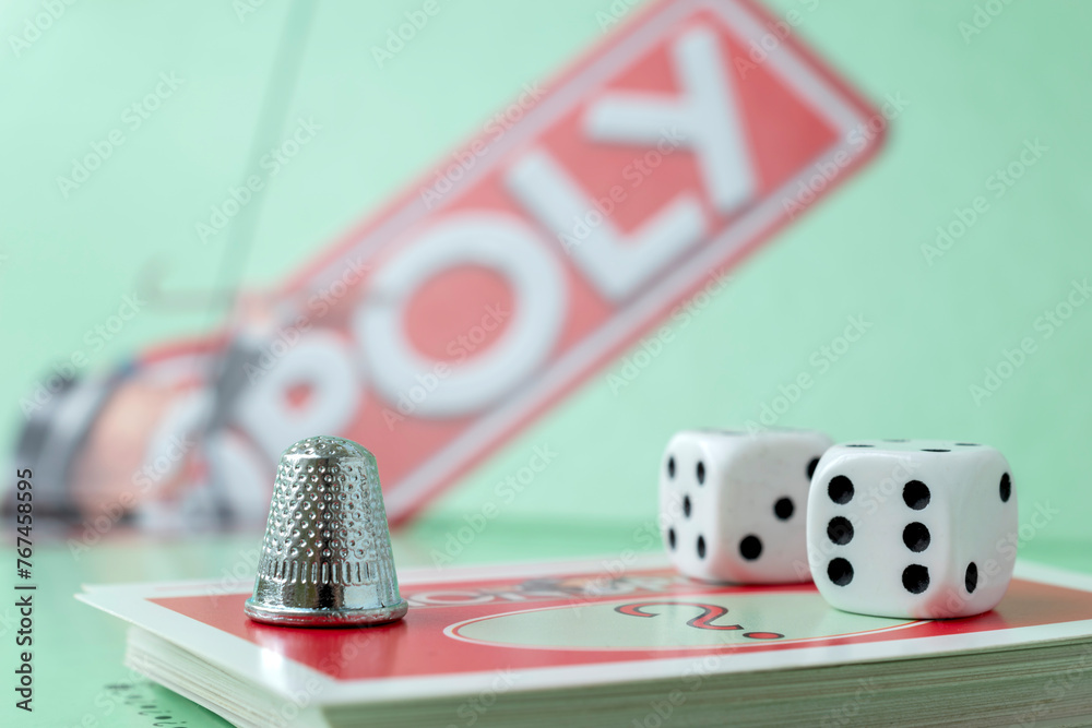 Kaunas, Lithuania - July 2021: close up of monopoly thimble token ...