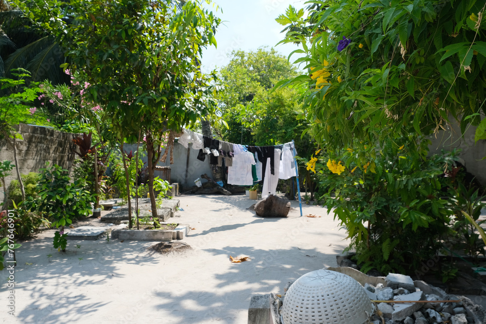 Beautiful local village at Mathiveri island. Mathiveri is one of the ...