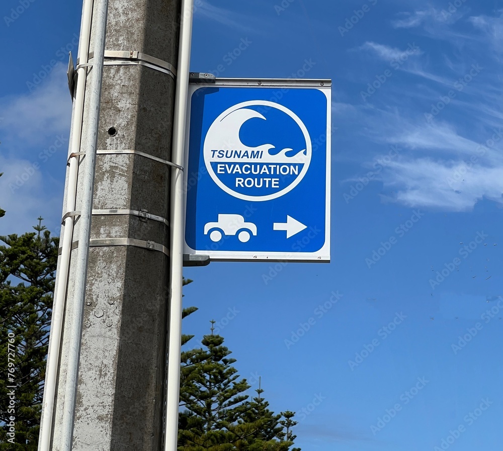 Tsunami Hazard Zone warning sign on the Pacific Ocean coast warn the ...