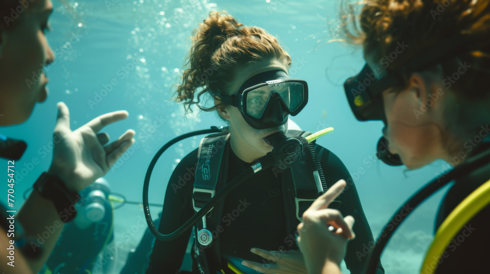 The diving instructor demonstrates proper techniques and safety ...