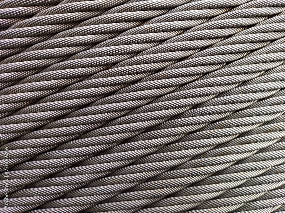 Grey Steelcable, macro shot, horizontal. Wire rope is composed of two ...