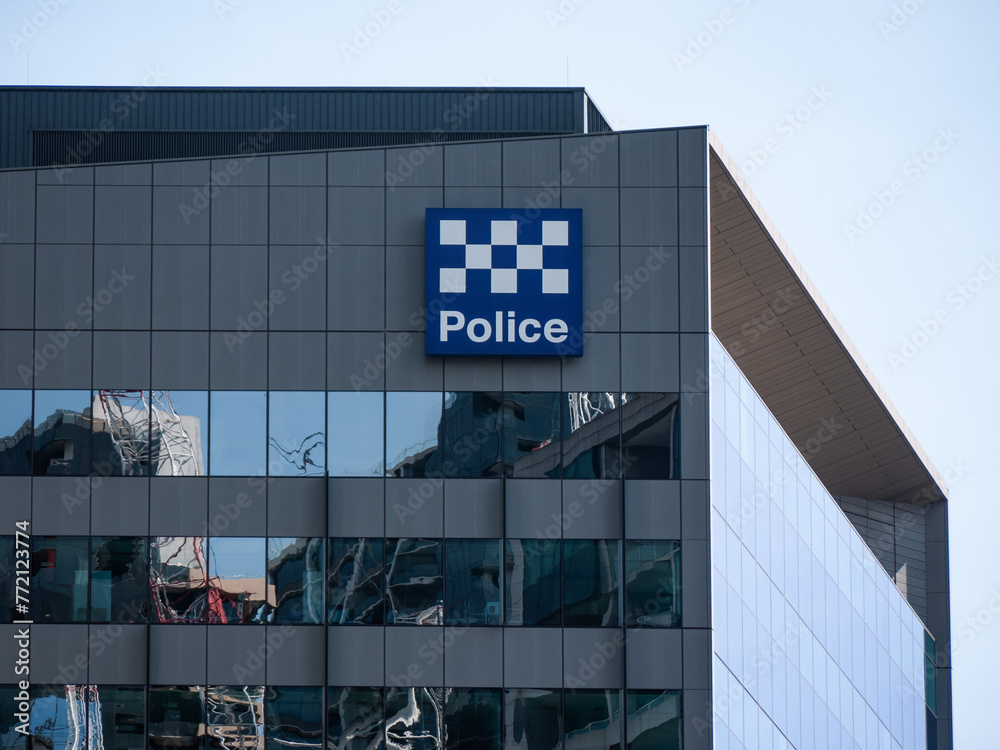 Sign of Victoria Police Station on the high-rise building headquarters ...