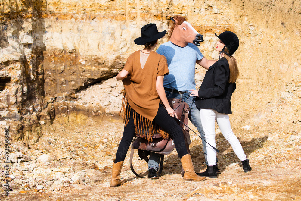 Crazy strange people with horse mask. Freaky young horsewoman women and ...