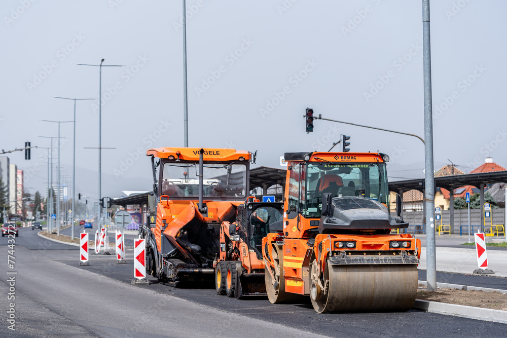 Ziar nad Hronom, Slovakia, Europe - March 31 2024: A modern road roller ...