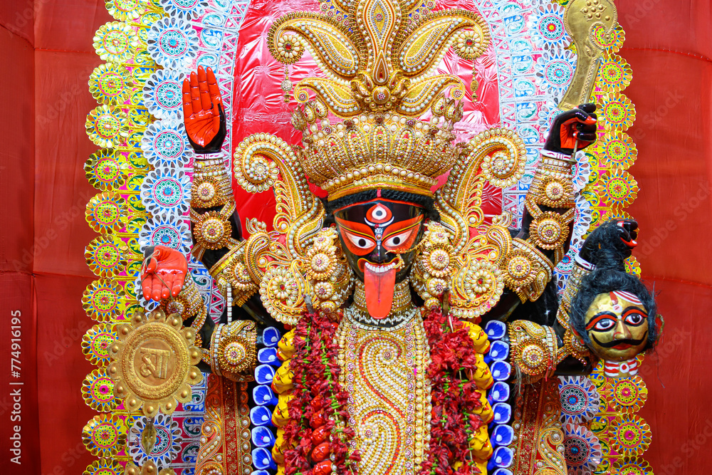 Idol of Goddess Maa Kali at a decorated puja pandal in West Bengal ...