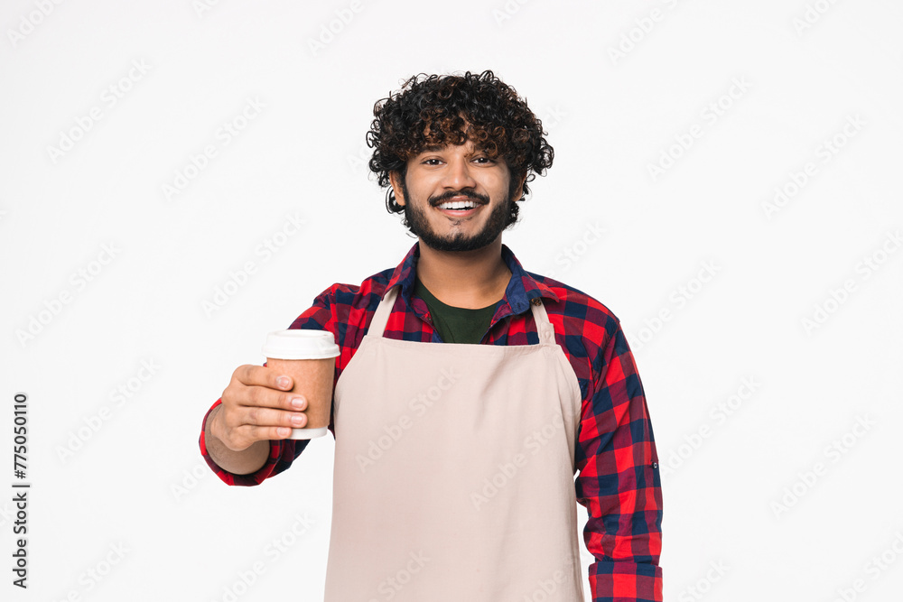 Smiley young Indian bar tender barista holding coffee cup isolated over ...
