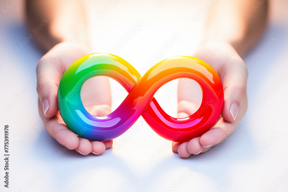 Colorful autism infinity rainbow symbol sign in outstretched woman ...