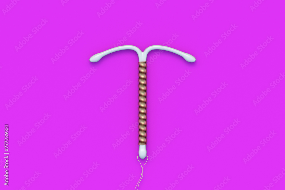 Birth control device on pink background. T-shape female contraceptive ...