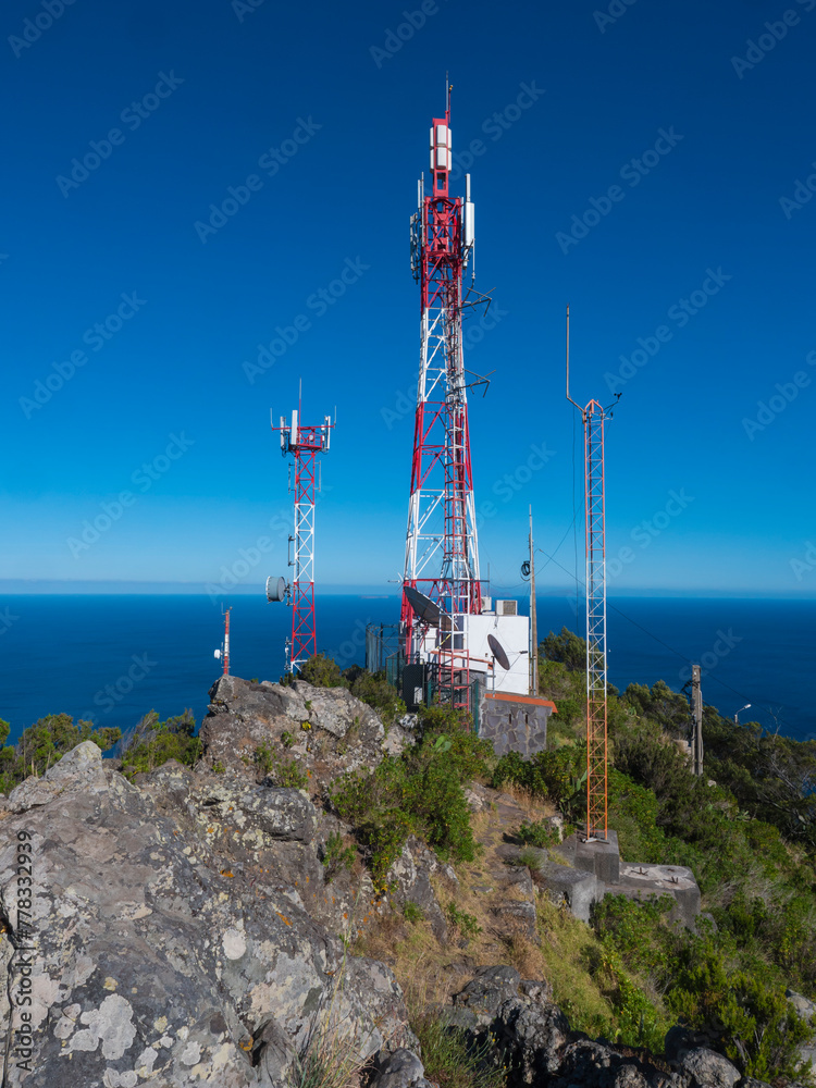 Telecommunication tower with antennas and blue sky background at Pico ...