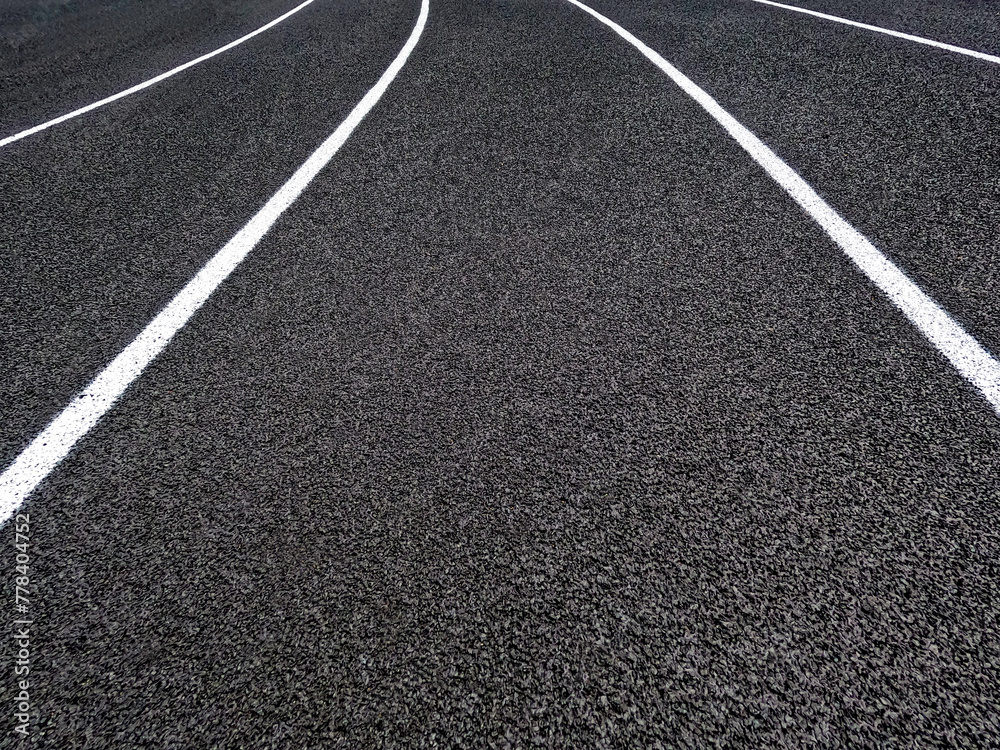 Track and Field Running Lanes. Overhead view of a rubber black running ...