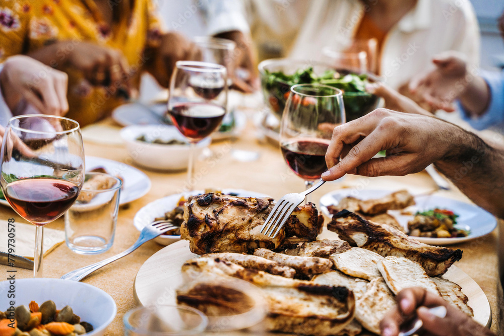 Stock-Foto „Happy family having bbq dinner party in restaurant rooftop ...