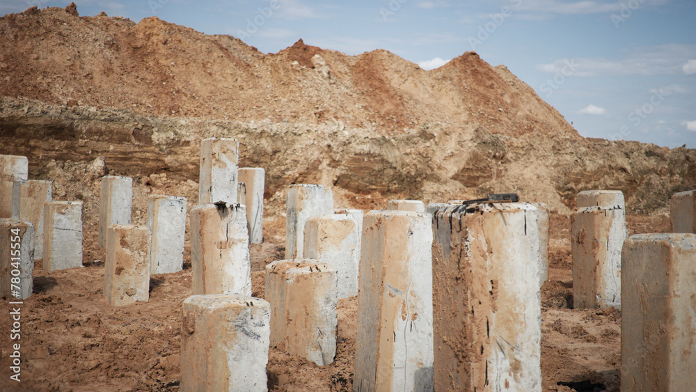 Pile driving in foundation pit for construction of apartment building ...