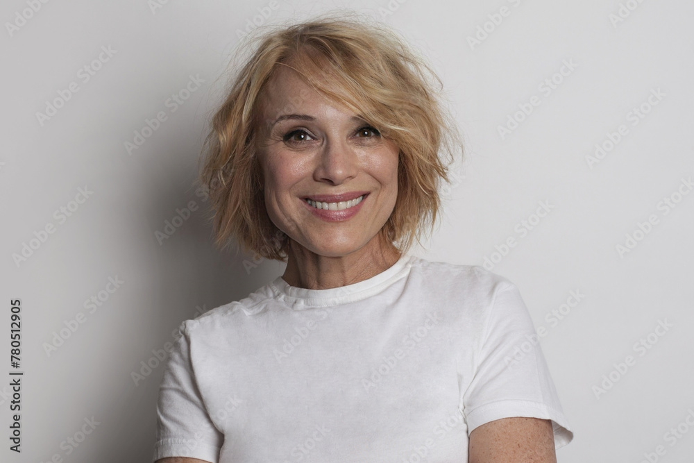 Confident successful mid adult woman with short hair and cute smile ...