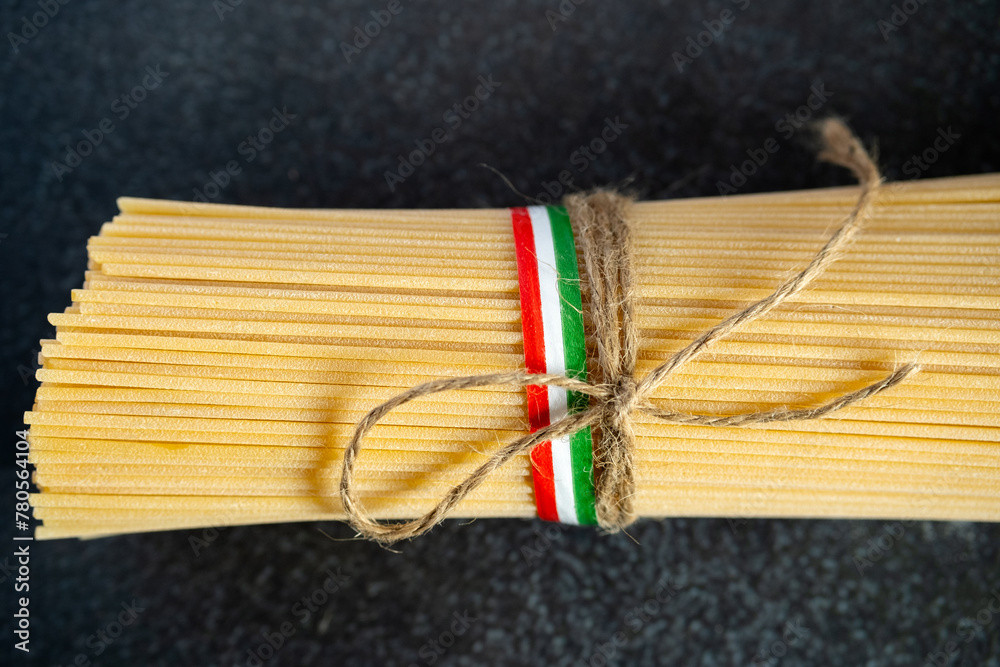 Italian noodle pasta spaghetti raw with empty space for ingredient ...