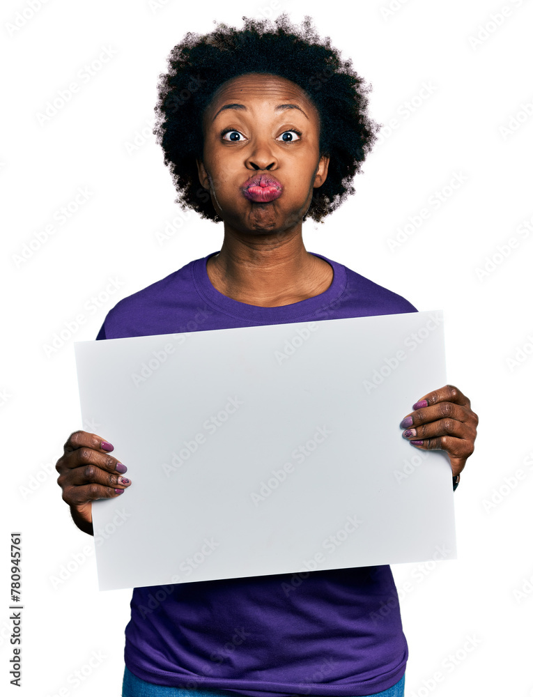 African american woman with afro hair holding blank empty banner ...