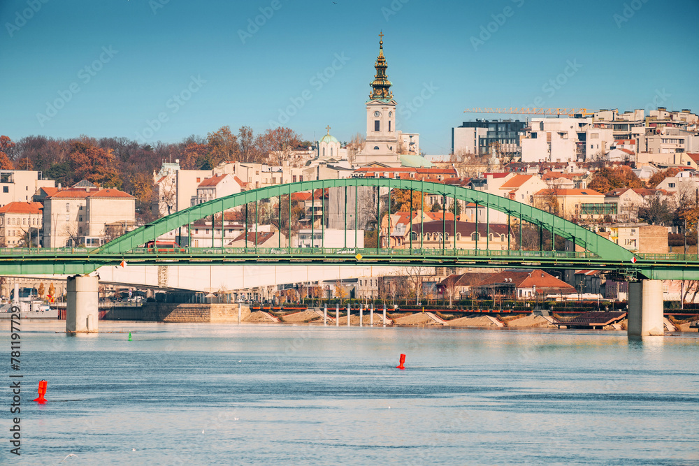 Serene waters of the Sava river frame Belgrade's skyline, blending ...