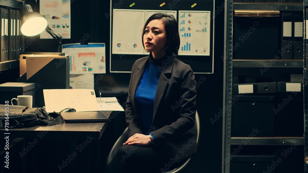 Stock-Foto „Detective looks at holographic images captured in real time ...