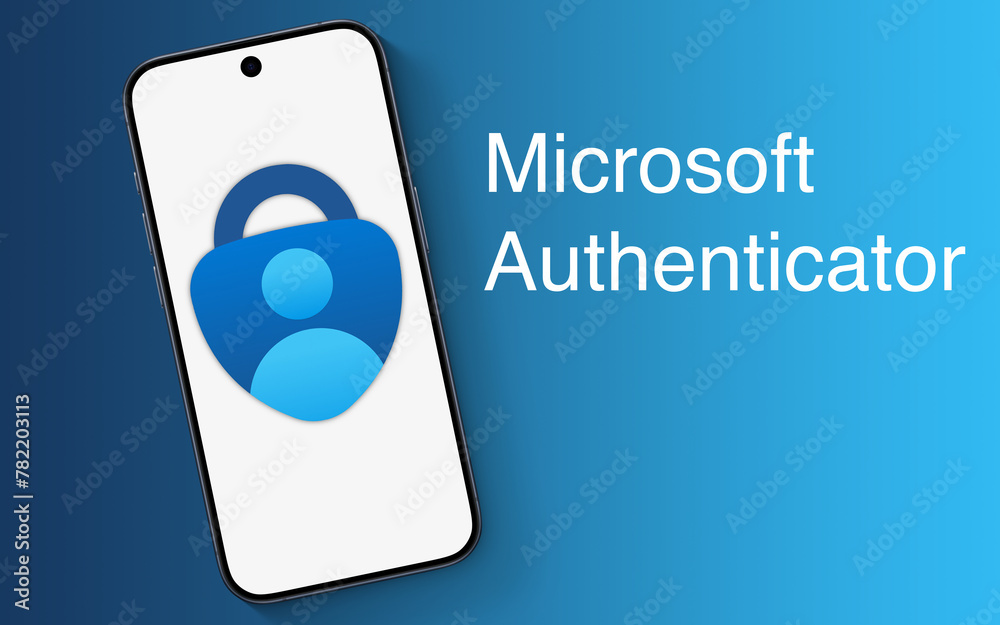 Microsoft Authenticator App logo is displayed on a modern smartphone laying on a blue ...