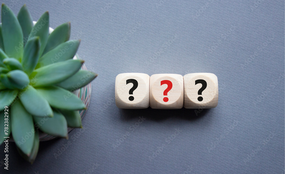 Question marks symbol. Concept words question mark on wooden cube ...