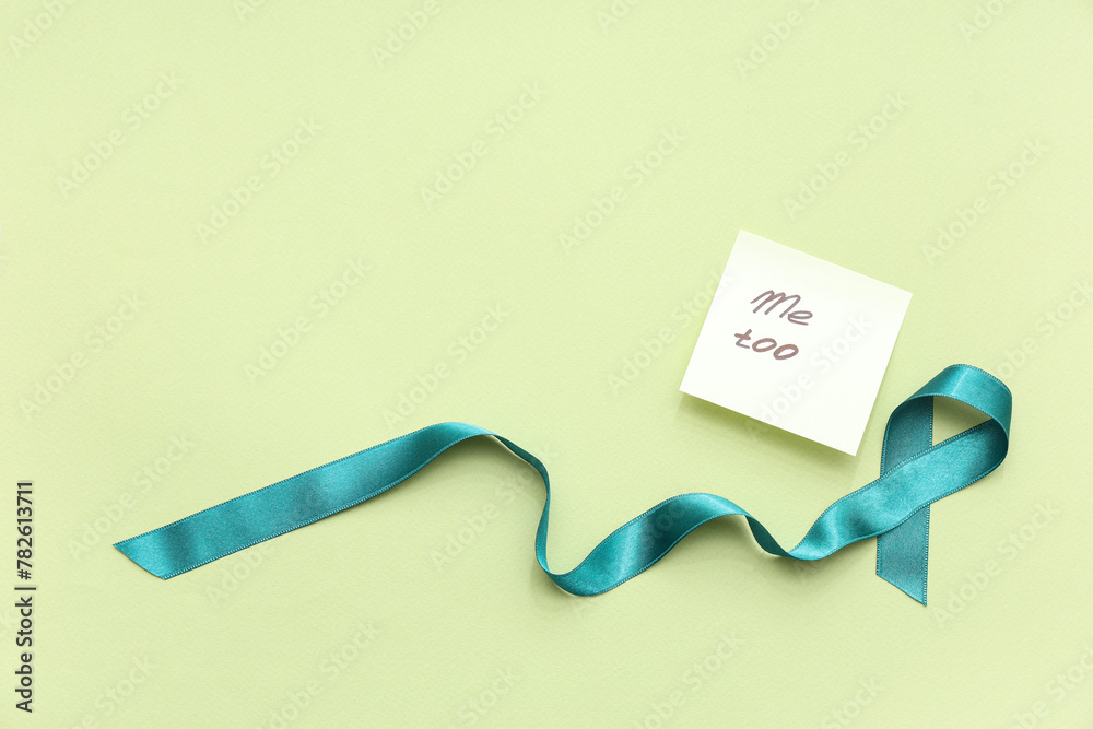 Teal ribbon and sticky note with text ME TOO on green background ...