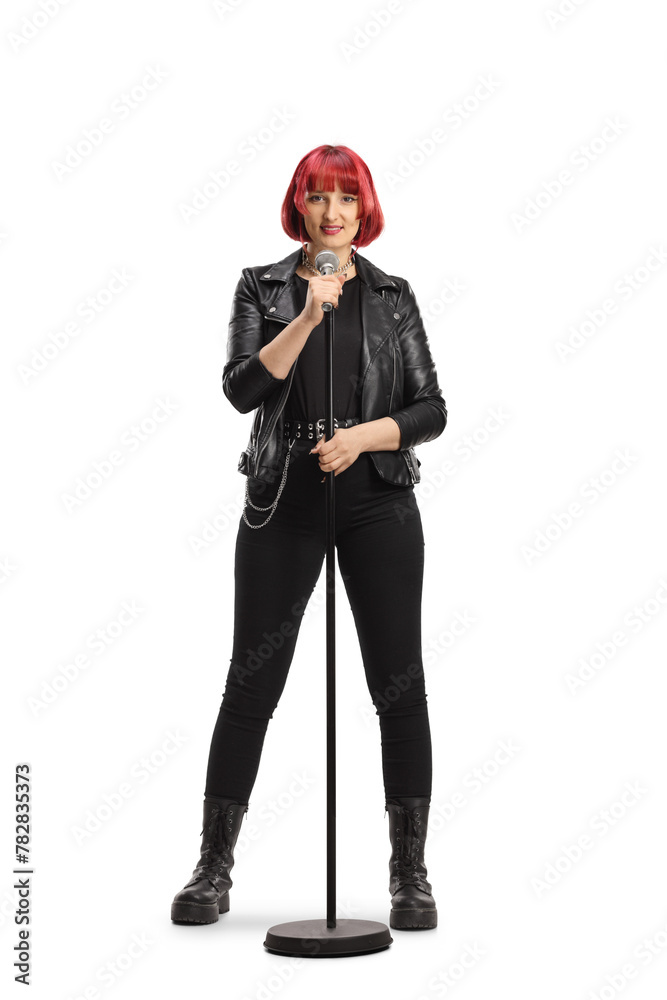 Gothic rock style female singer with a microphone Stock Photo | Adobe Stock