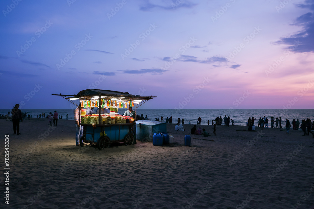 Kozhikode beach night view sunset in Kerala India. Food snacks stalls ...