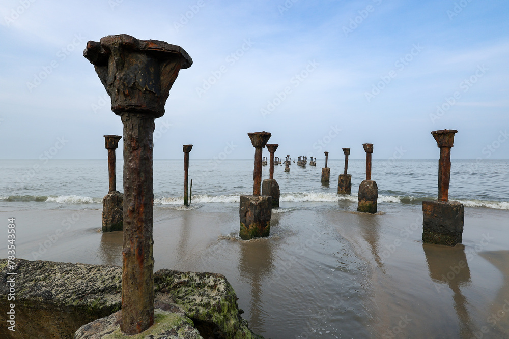 Old ruined sea piers in Calicut Kozhikode beach in Kerala India ...