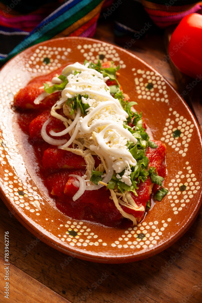 Entomatadas. Also known as Enjitomatadas, a typical dish of Mexican ...