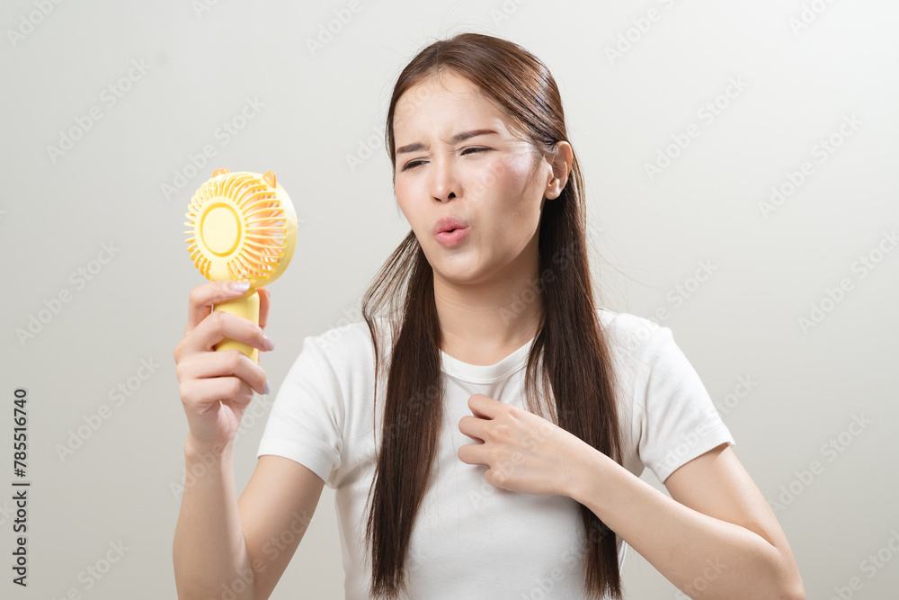 Suffering summer heat wave stroke, hot weather, tired asian young woman ...