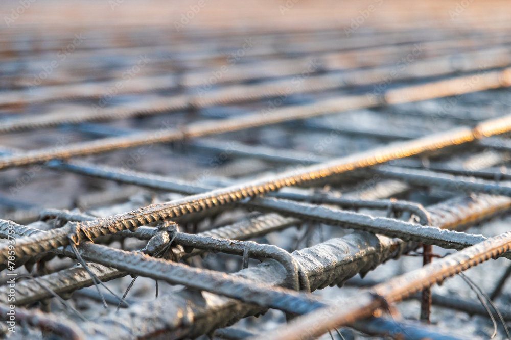 Pouring concrete for the reinforcement frame for the interfloor slab ...