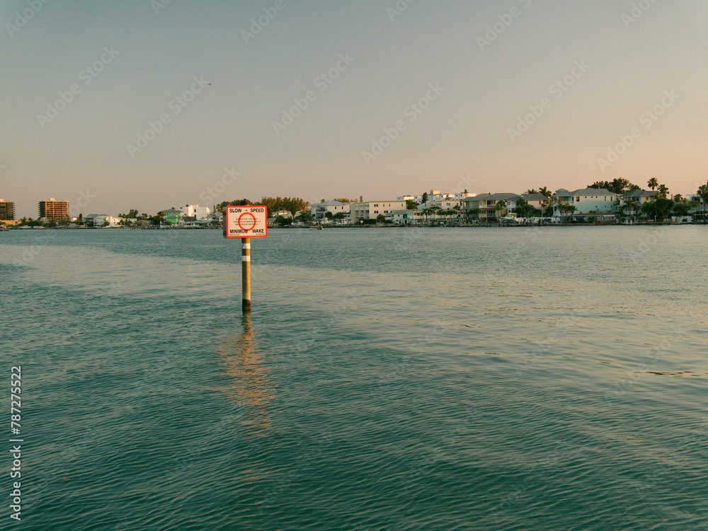 Horizontal View southwest at channel wake warning sign at Ron McKenney ...