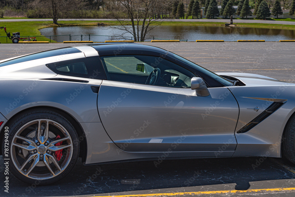 corvette copy space background super car on a parking lot, natural ...