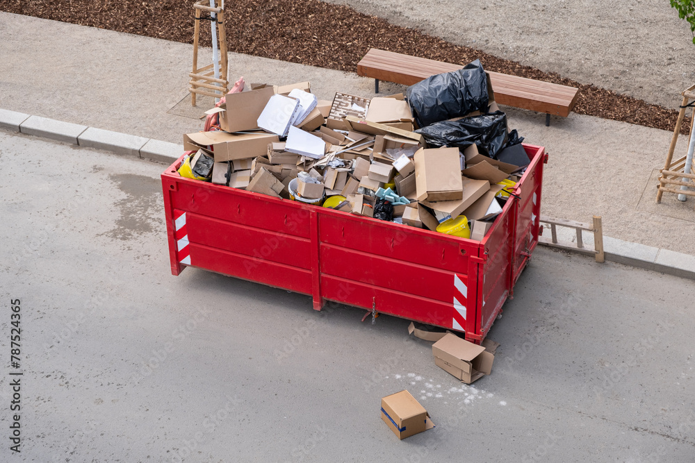 Photo Stock A waste container overflowed A steel industrial with ...