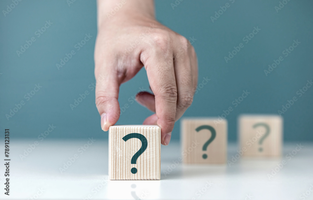 wooden question mark. frequently asked questions marketing plan for ...