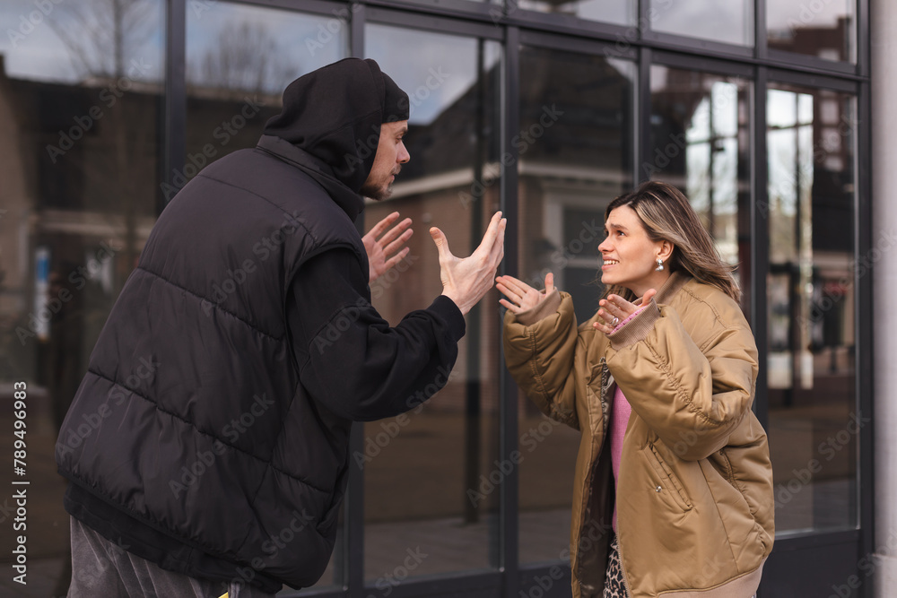 Young arguing sad couple two friends family man woman in casual clothes ...