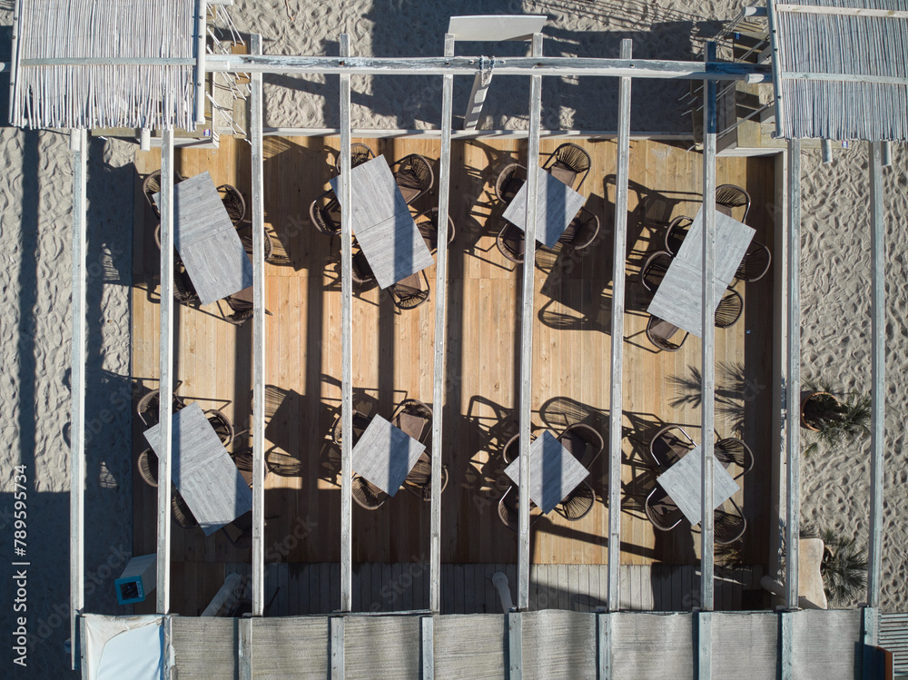 Overhead view capturing the ambiance of a beachfront restaurant's ...