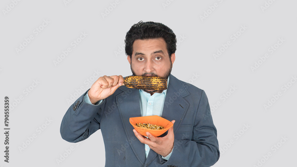 amazing facial expressions of eating a young boy eating corn cob with ...