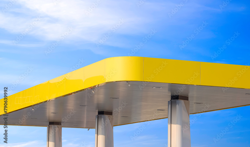 Modern yellow canopy roof of outdoor distribution service point with ...