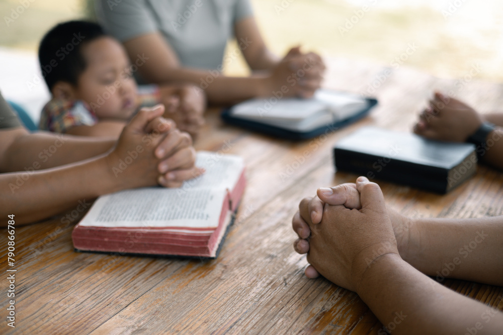Woman joined hands with her faith group, coming together to pray as a ...