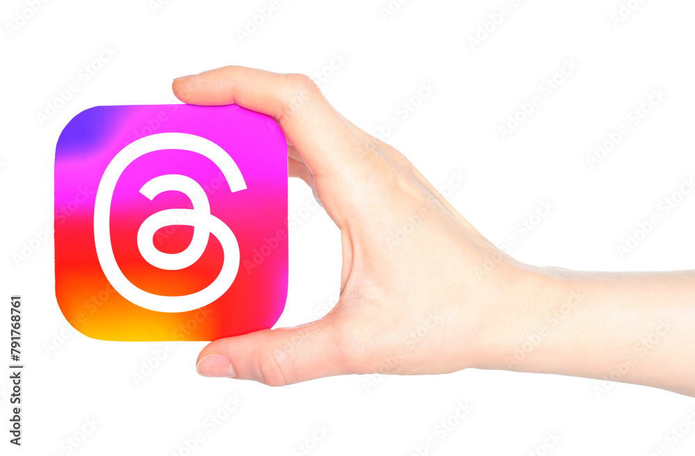 Hand holds paper Threads mobile app icon, on transparent background ...