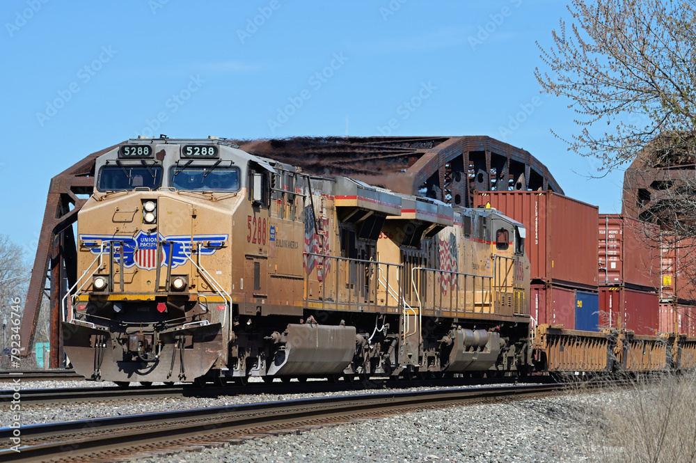 Union Pacific Railroad locomotives lead an intermodal freight train ...