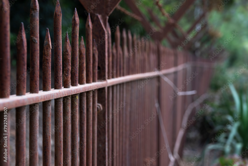 Foto de Stock Rusty fencing with vertical bars and a V-shape with ...