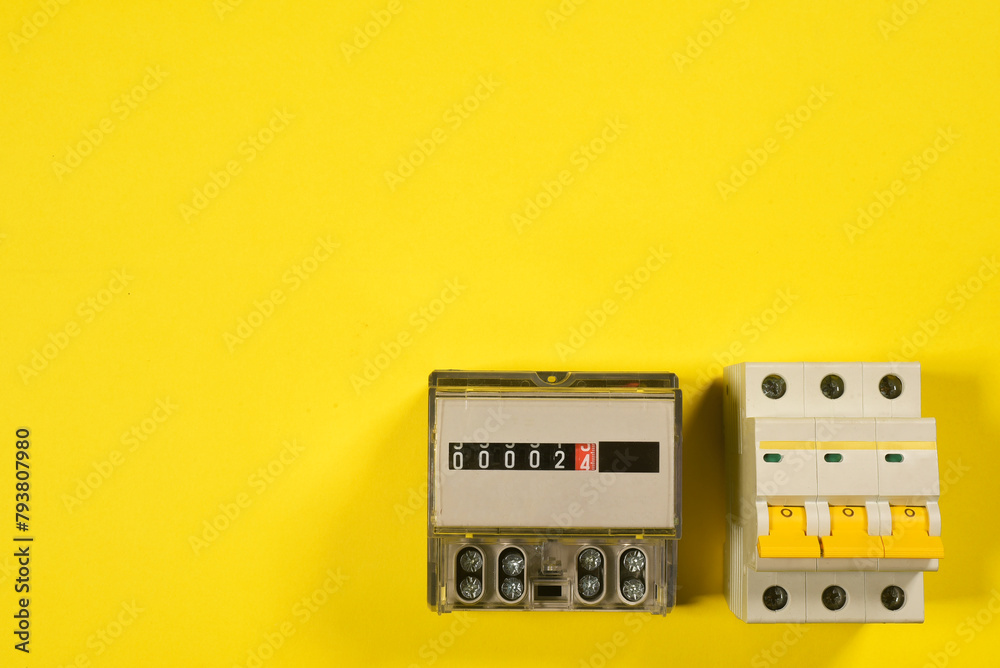 Electricity meter and automatic switch circuit breaker close up on the ...