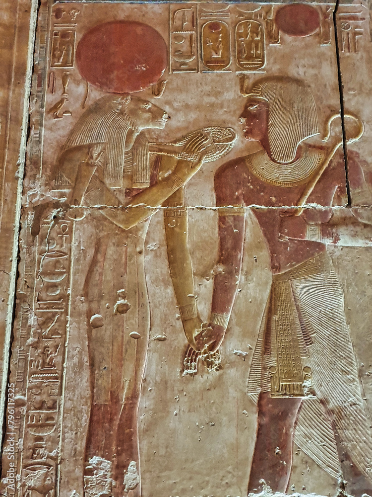Pharoah Seti I offering prayers to lion goddess Sekhmet in a painted ...