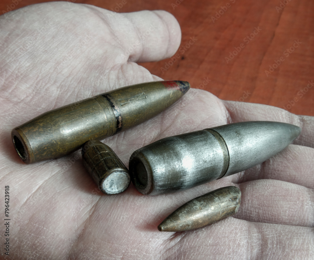 Fired projectiles of various calibers from various military weapons ...