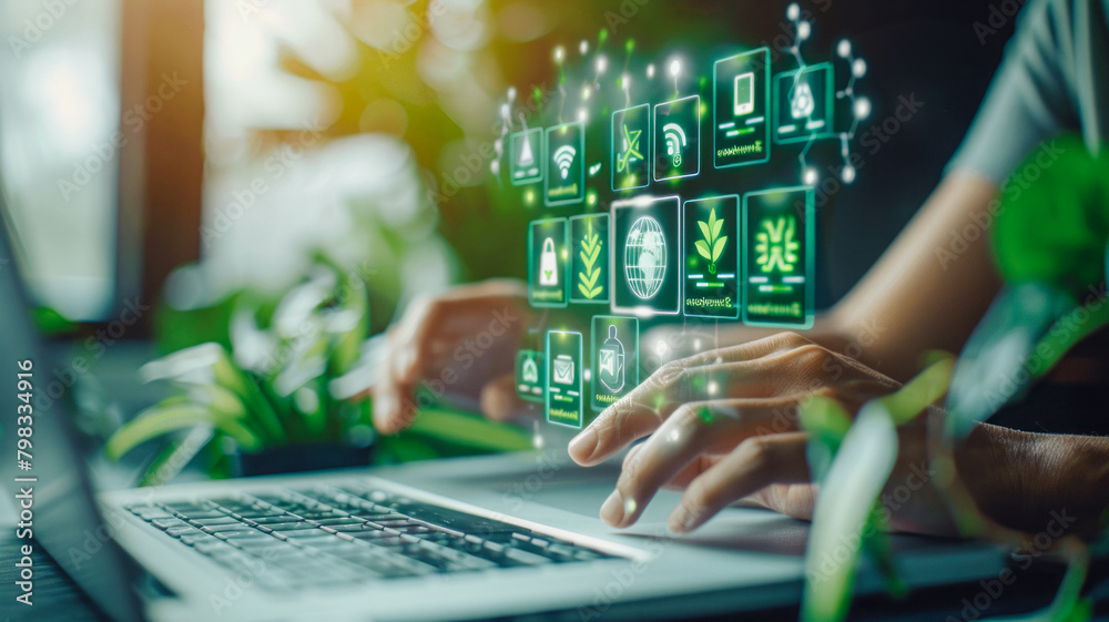 Green Tech Interface: Person in denim uses a laptop with icons like a ...